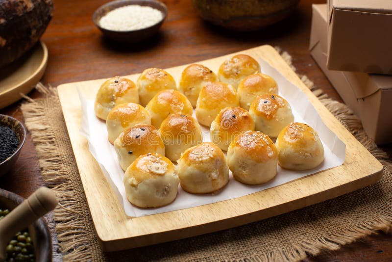 Chinese Pastry Filled with Mung Bean Paste, Taro, and Salted Egg Stock ...