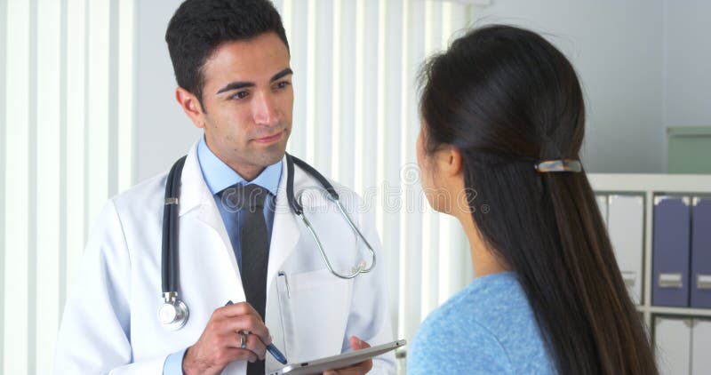 Male doctor at work stock image. Image of clinical, mobile - 15266831