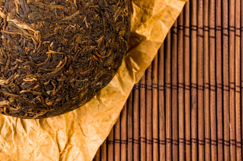 Chinese Pressed PU-erh Tea on Wrapping Paper, Close-up, Macro Stock ...