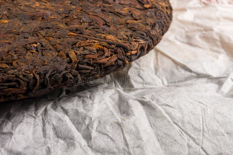 Chinese Pressed PU-erh Tea on Wrapping Paper, Close-up, Macro Stock ...