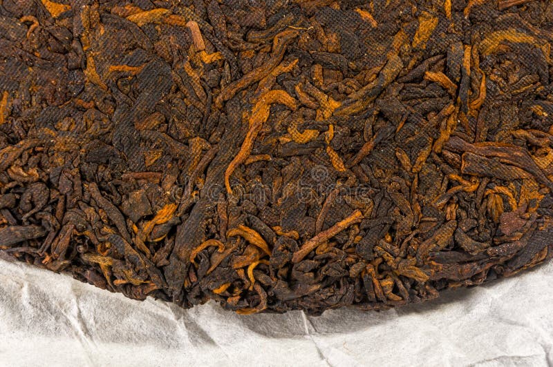 Chinese Pressed PU-erh Tea on Wrapping Paper, Close-up, Macro Stock ...