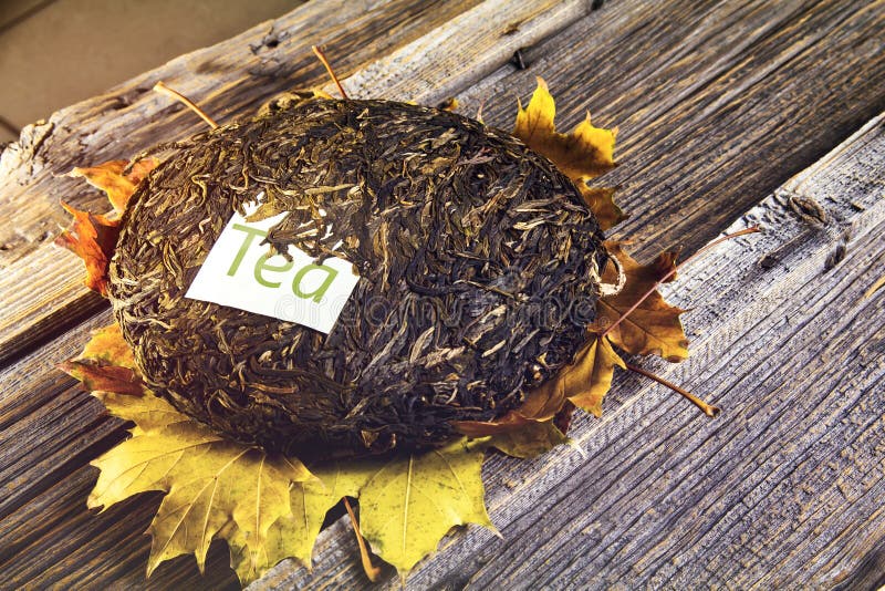 Chinese Pressed Tea on Wooden Table Stock Image - Image of gold, season ...