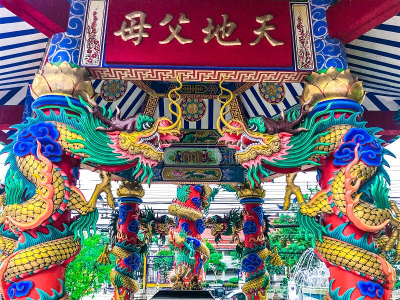 The Chinese Religious Pavilion Features a Dragon Statue beside the ...