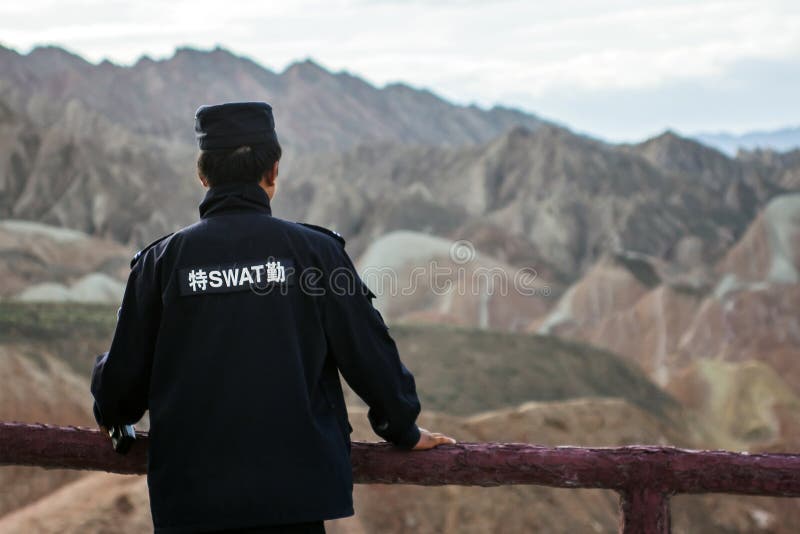 A Chinese Security Guard is Viewing Landscape. Editorial Photo - Image ...