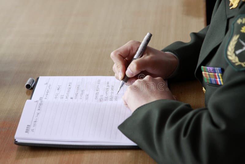 Chinese Soldier Hand Taking Notes Stock Image - Image of notebook, flag ...
