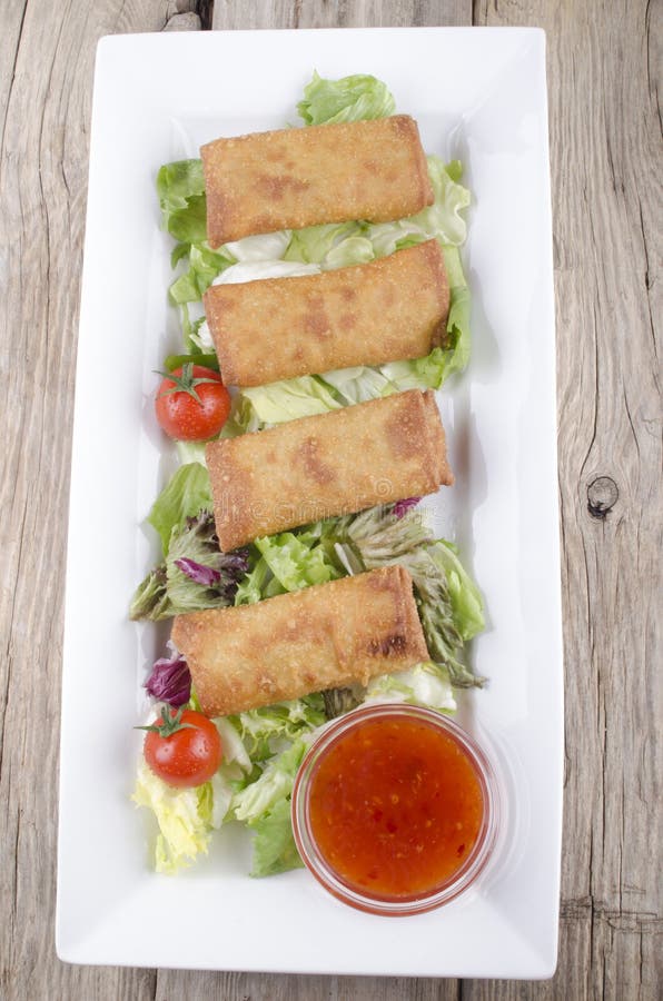 Chinese Spring Rolls on a Plate Stock Image - Image of wood, spring ...