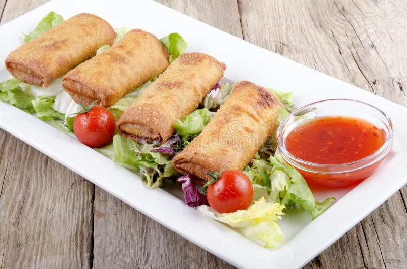 Chinese Spring Rolls on a Plate Stock Image - Image of sauce, white ...