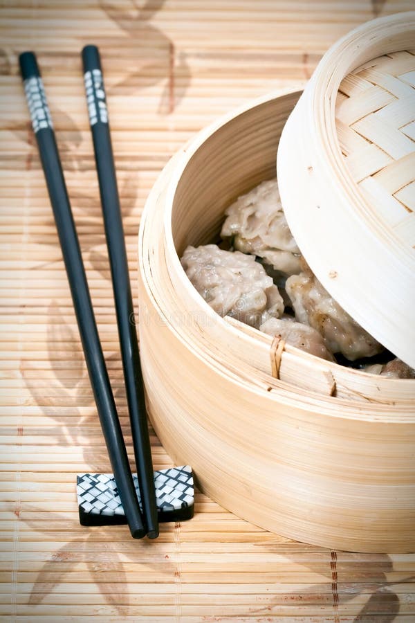 Chinese steamed dumplings stock image. Image of sticks - 14572253