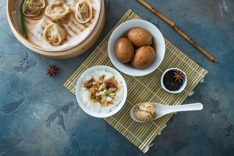 Chinese Streamed Dumpling with Tea Eggs and Porrige Stock Photo - Image ...