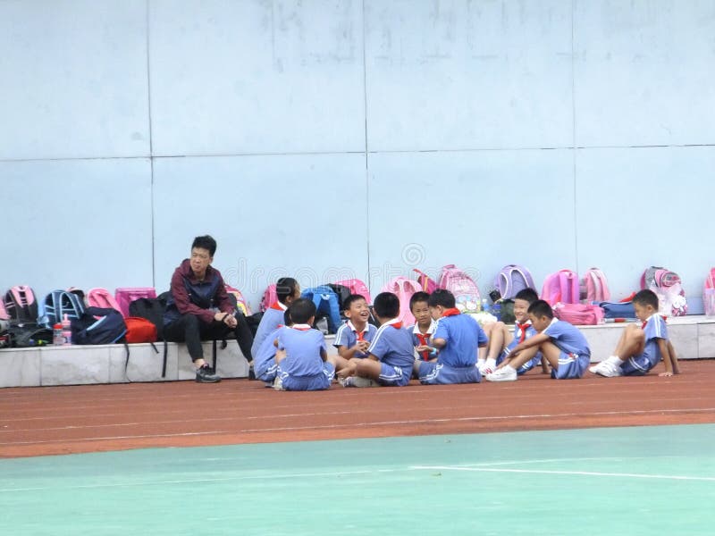 Chinese Students Sitting Ground Physical Education Class Stock Photos ...