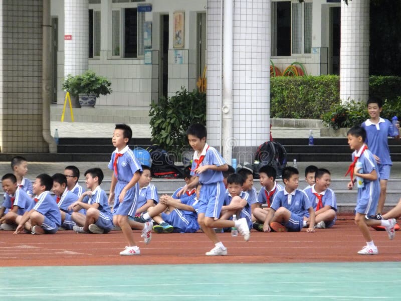 Chinese Students Sitting Ground Physical Education Class Stock Photos ...