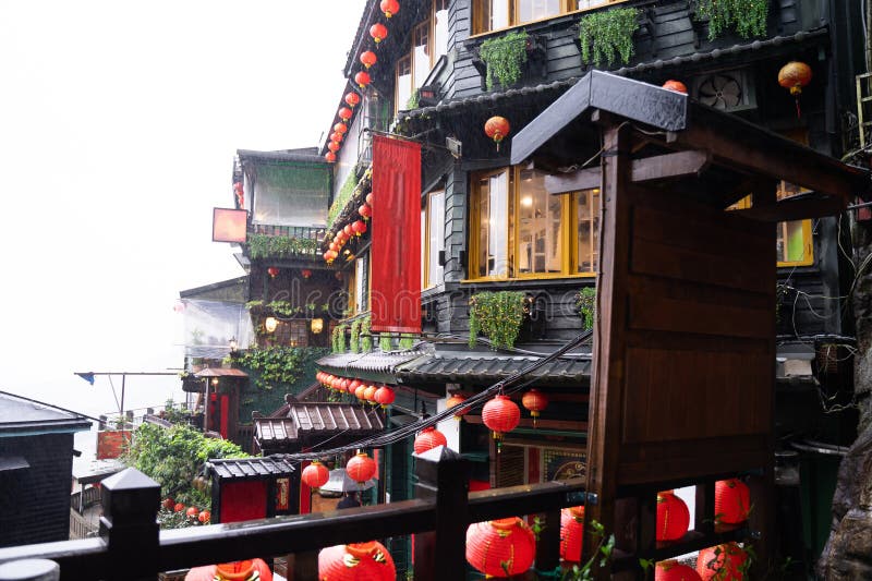 Chinese Style Cafe Decorated with Red Lanterns, the Sky is Cloudy and ...