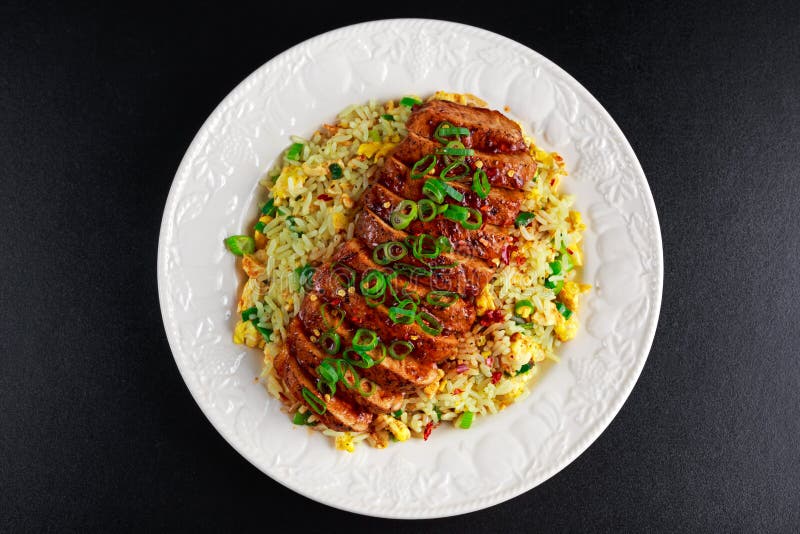 Chinese Style Egg Fried Rice with Sliced Pork Fillet Stock Image ...