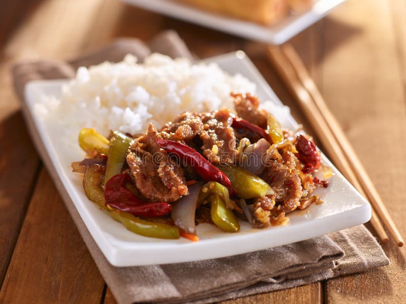 Chinese Szechuan Beef with Rice on Plate Stock Image - Image of focus ...