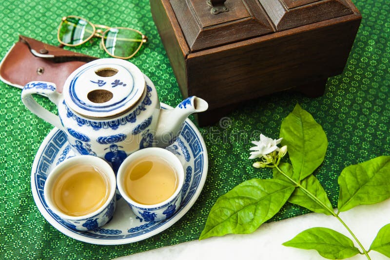 Chinese Tea with Glasses, Books and Wooden Boxes on the Table Stock ...