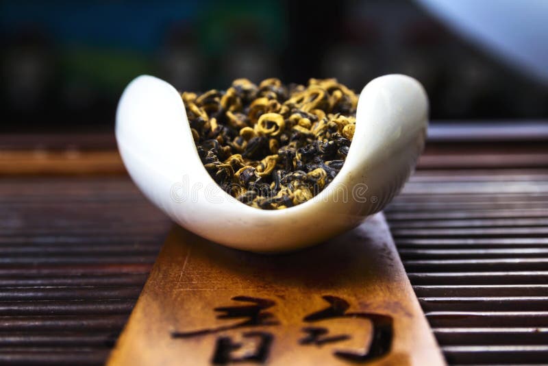 Chinese tea on wood plate stock photo. Image of macro - 71094608