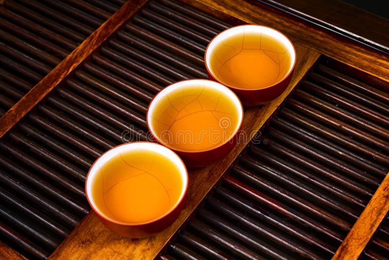Chinese tea on wood plate stock photo. Image of macro - 71094608
