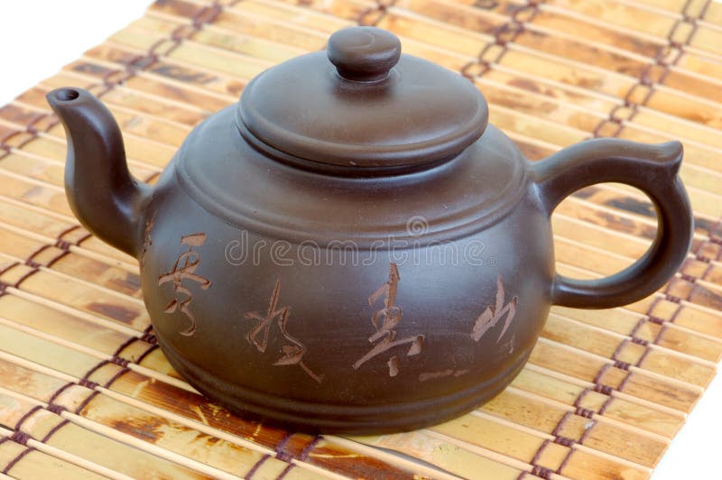 Chinese teapot on mat stock photo. Image of teapot, clay - 6271594