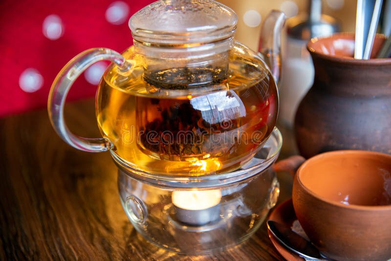Chinese Teapot with Tea, on Burning Support from Glass Stock Image ...