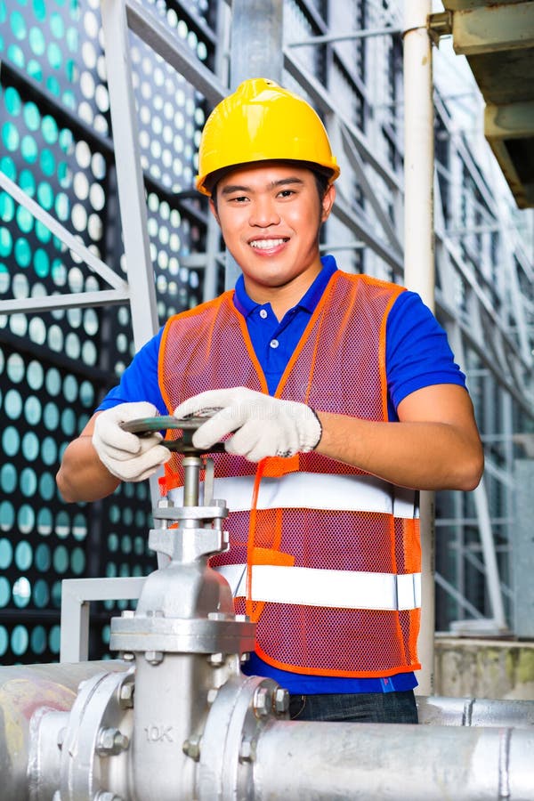 Chinese Technician Working on Valve Stock Photo - Image of equipment ...