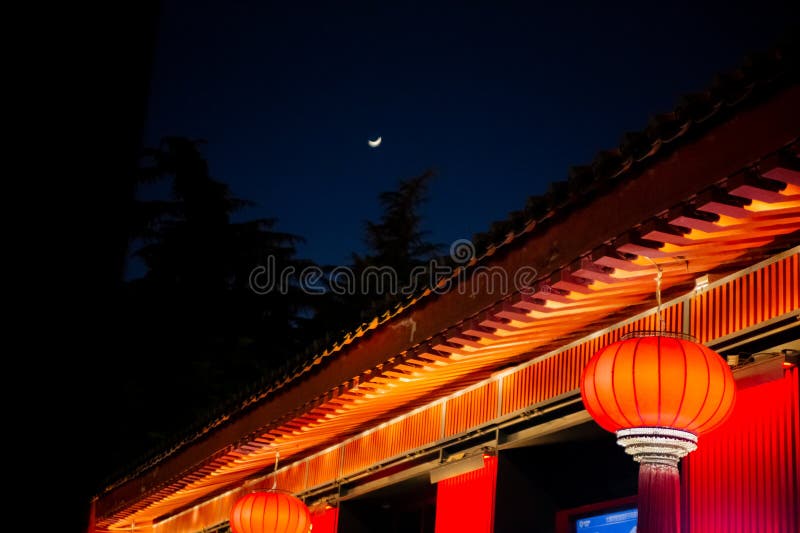 Red Light Up on the Chinese Temple Under the Crescent Moon. Stock Image ...