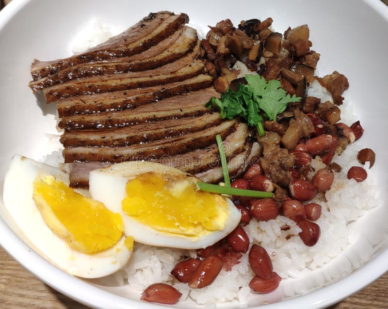 Goose Meat with Eggs and Peanuts on Rice Stock Photo - Image of eggs ...