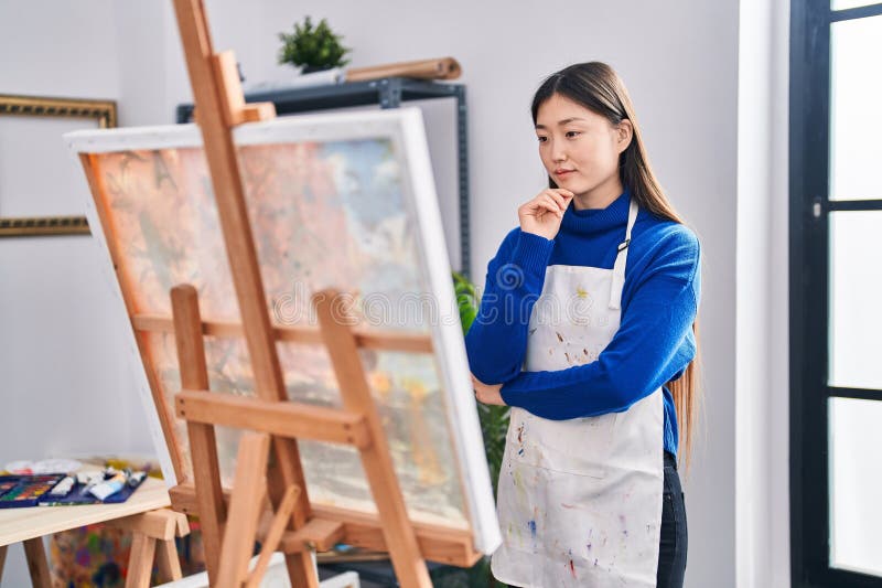 Chinese Woman Artist Looking Draw with Doubt Expression at Art Studio ...