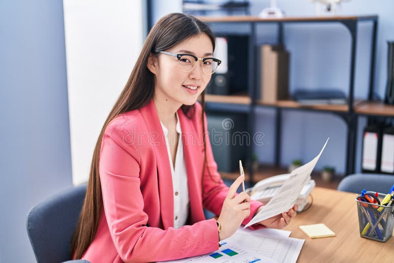 Chinese Woman Business Worker Reading Documents at Office Stock Image ...