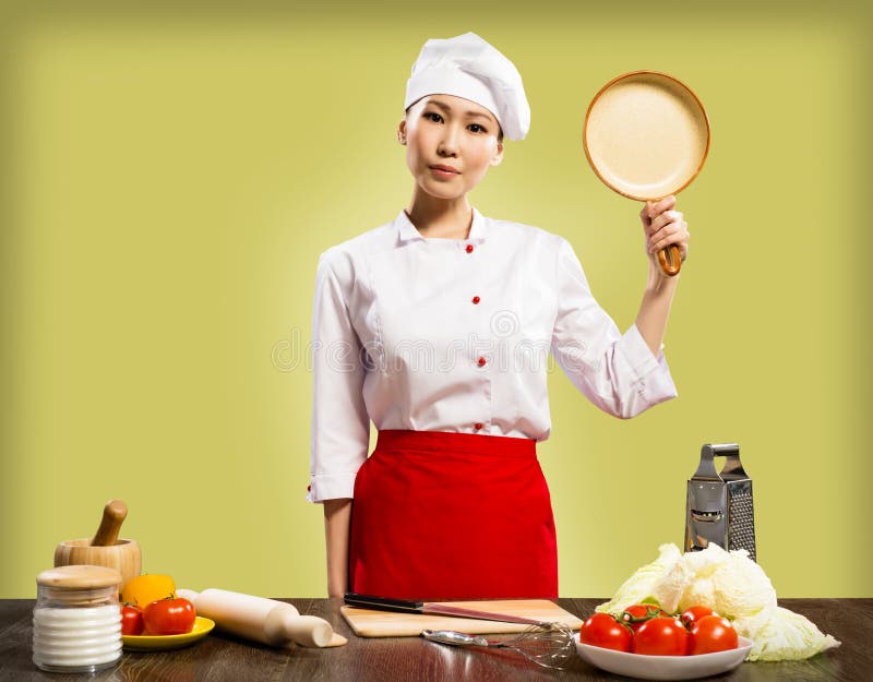Chinese Woman Chef Holding a Ceramic Pan Stock Photo - Image of emotion ...