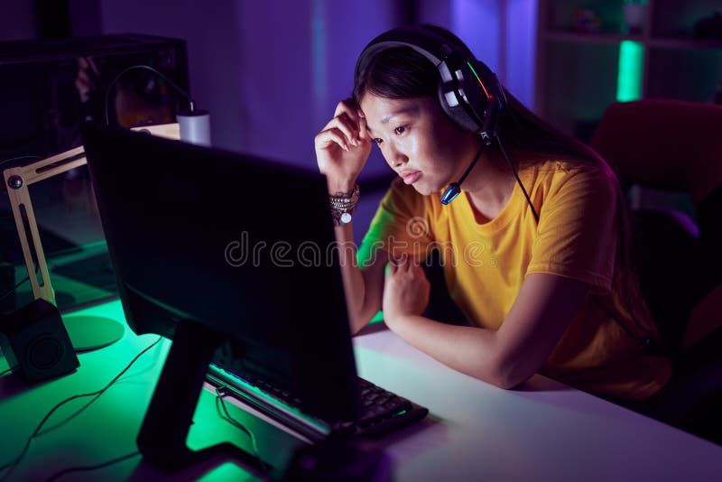 Chinese Woman Streamer Stressed Using Computer at Gaming Room Stock ...