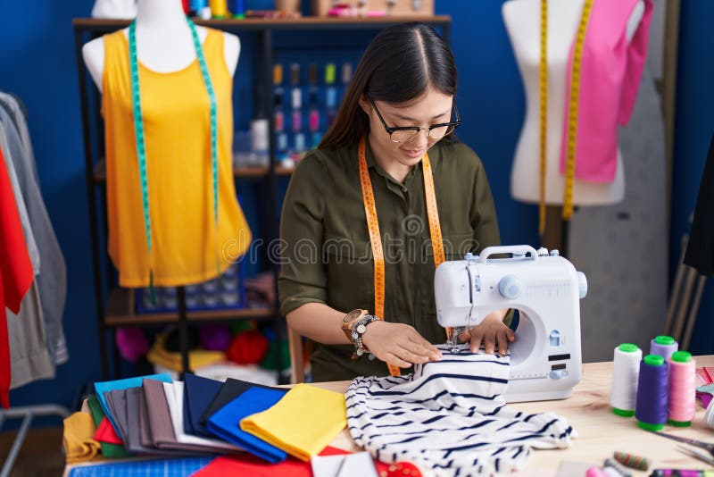 Chinese Woman Tailor Smiling Confident Using Sewing Machine at Sewing ...