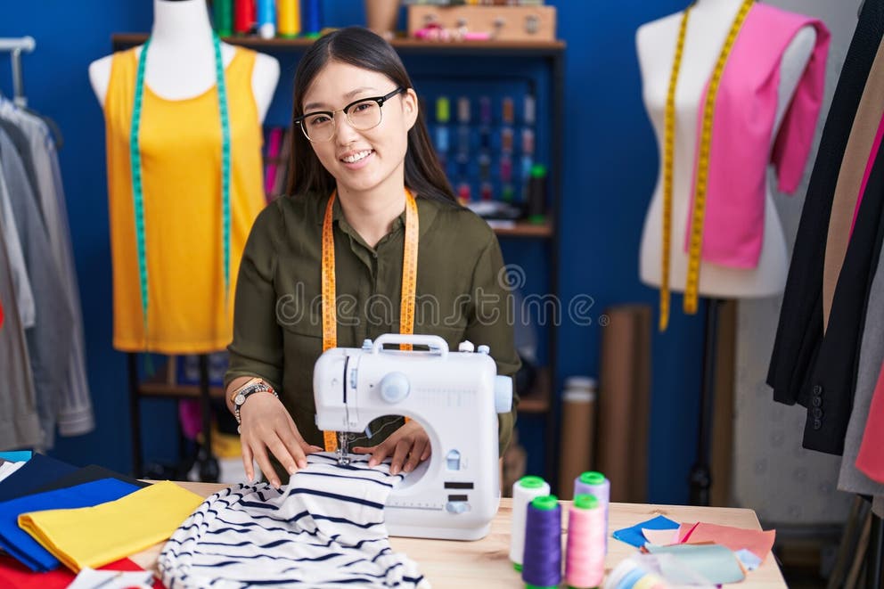 Chinese Woman Tailor Smiling Confident Using Sewing Machine at Sewing ...