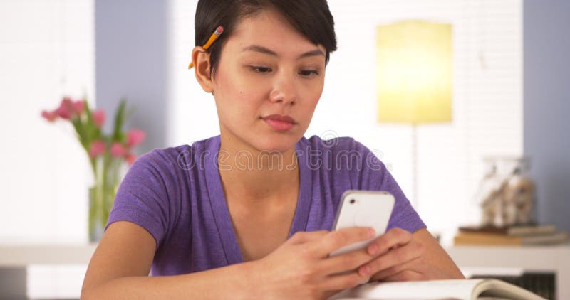 Chinese Woman Texting Classmate on Smartphone Stock Photo - Image of ...