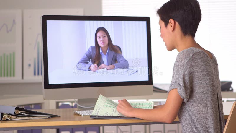 Two Chinese Women Engaging in Video Conference Stock Footage - Video of ...