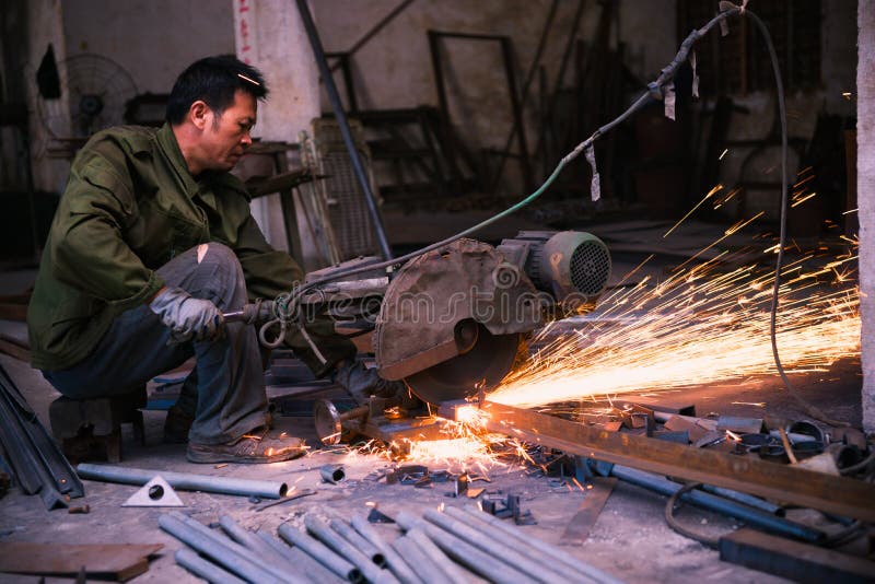 Chinese Worker Cutting Metal Stock Image - Image of middle, worker ...