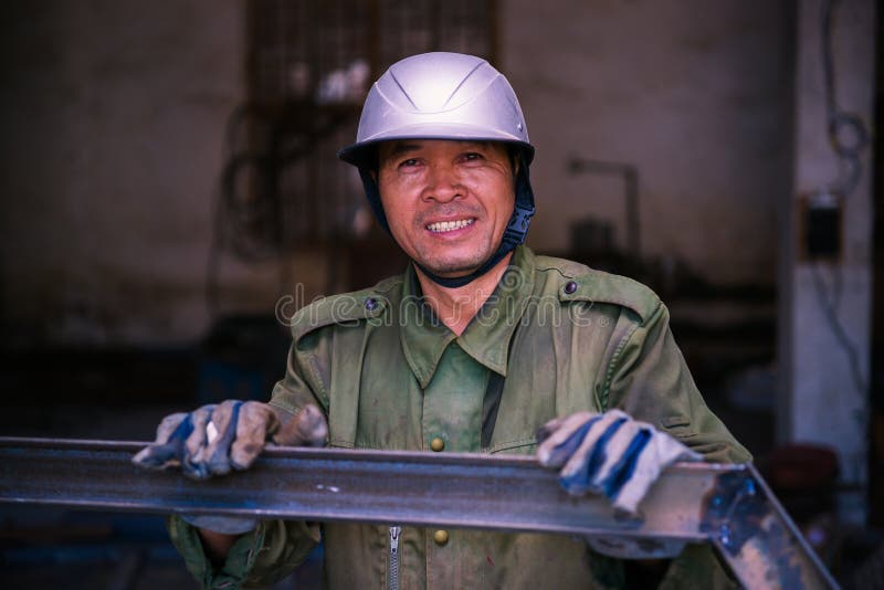 Chinese Worker Welding Metal Stock Image - Image of workshop, welding ...