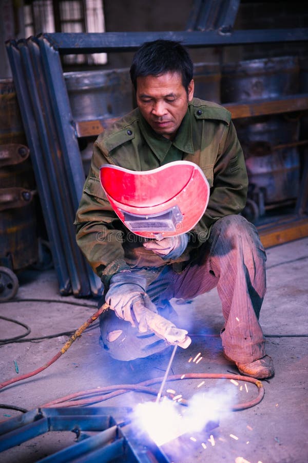 Chinese Worker Welding Metal Stock Image - Image of interior, adult ...