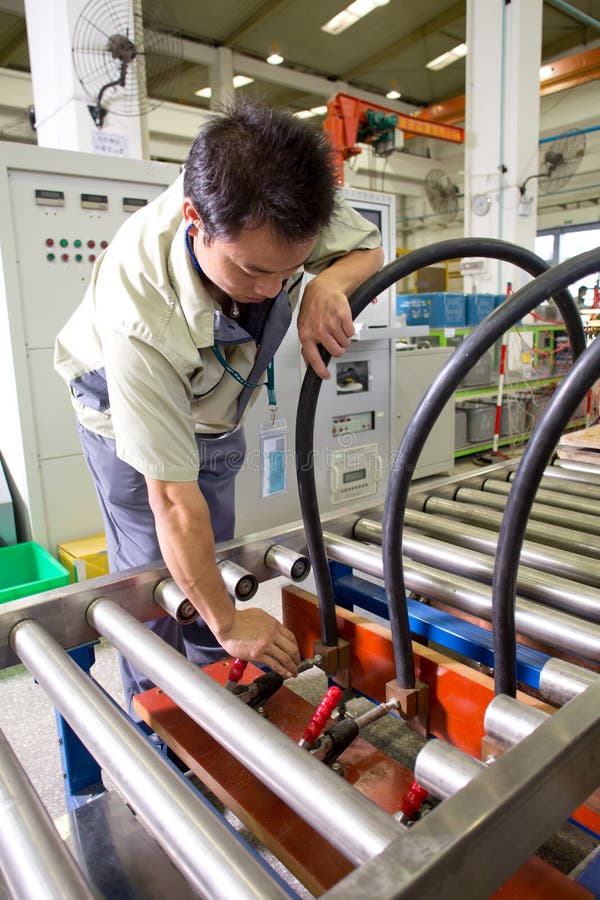 Chinese workers editorial stock photo. Image of factory - 26843953