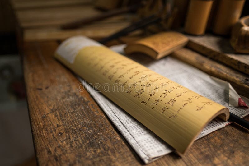 Chinese writing on bamboo stock image. Image of strokes - 7502031