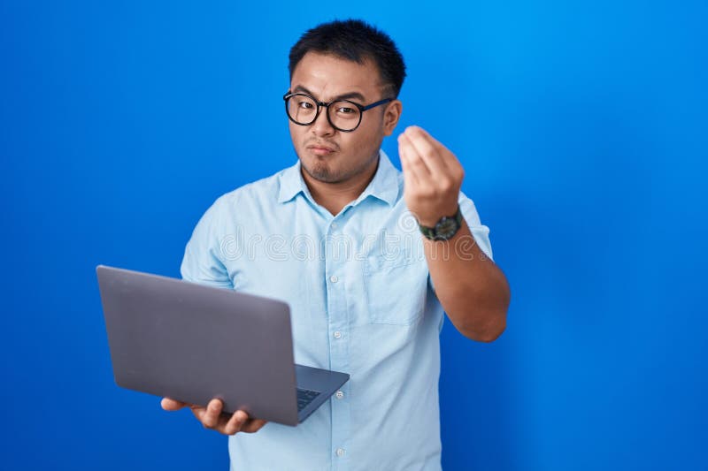Chinese Young Man Using Computer Laptop Doing Italian Gesture with Hand ...