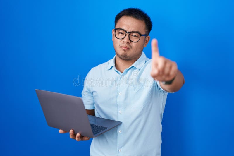 Young Chinese Man Preschool Teacher Using Touchpad Sitting on Table at ...