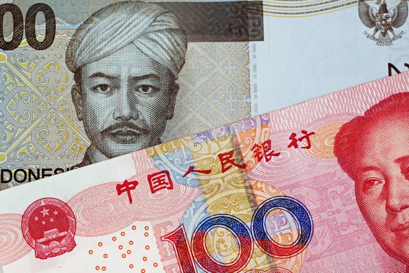 Chinese 100 Yuan Bank Note with 2000 Indonesian Rupiah Bank Note Stock ...