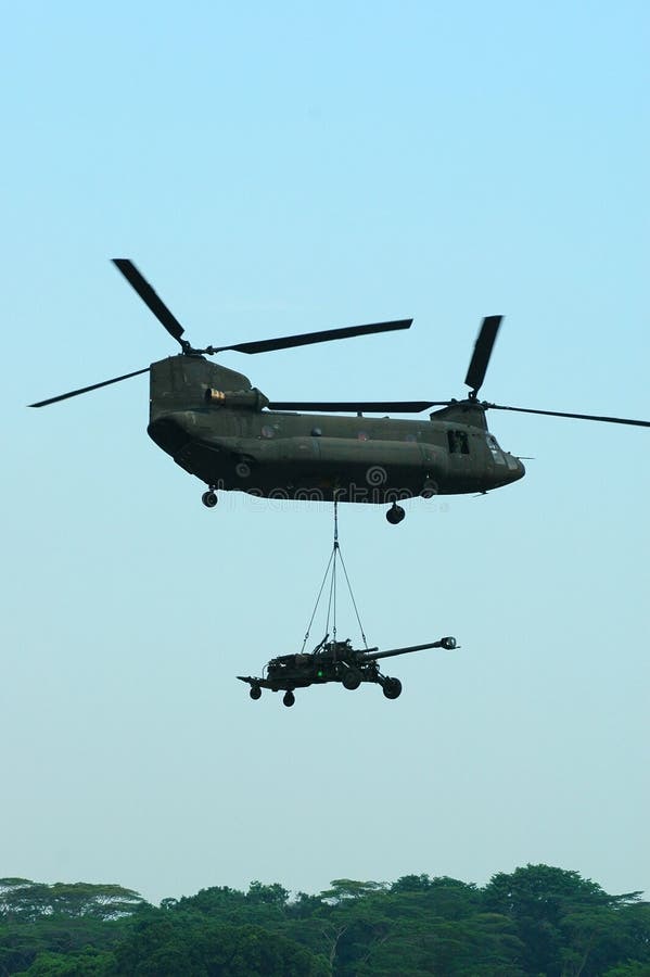 Chinook carrying artillery stock image. Image of troops - 1214791