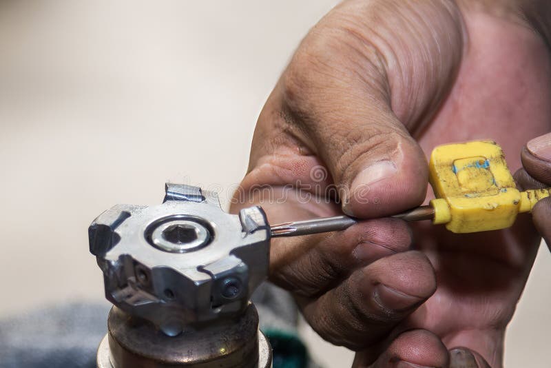 The Chip Insert Replacement Process by Machine Operator Stock Image ...