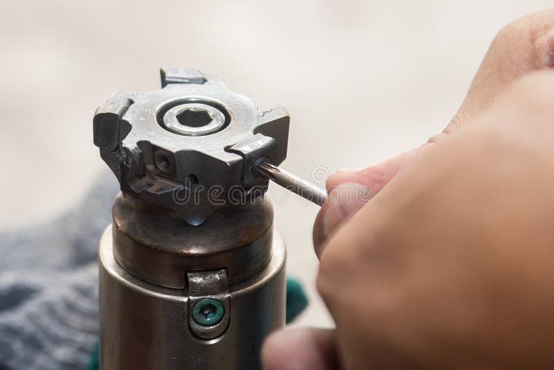 The Chip Insert Replacement Process by Machine Operator Stock Photo ...