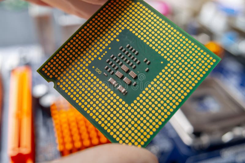 Chip Microprocessor in the Hands of an Engineer Technician for the ...