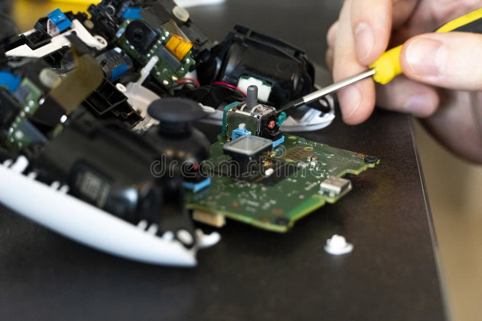 Chip Repair Engineer with Screwdriver Fixing Controller Stock Photo ...