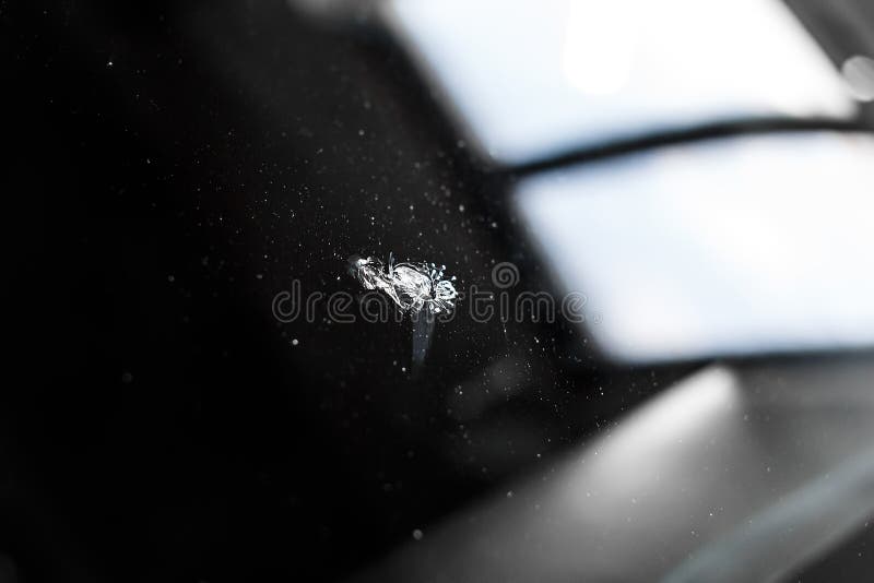 Chip from a Stone on the Windshield of the Car Stock Photo - Image of ...