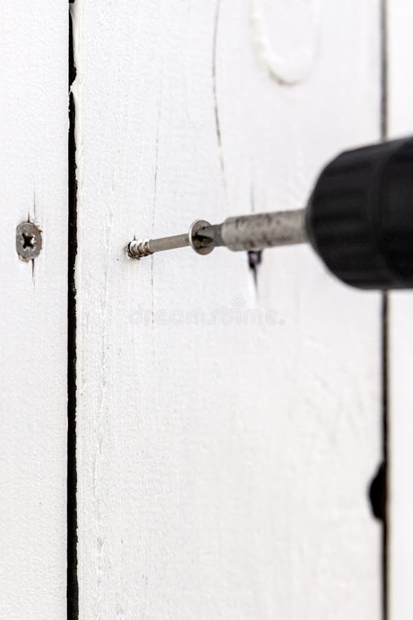 A Chipboard is Screwed into a Board Stock Photo - Image of concept ...