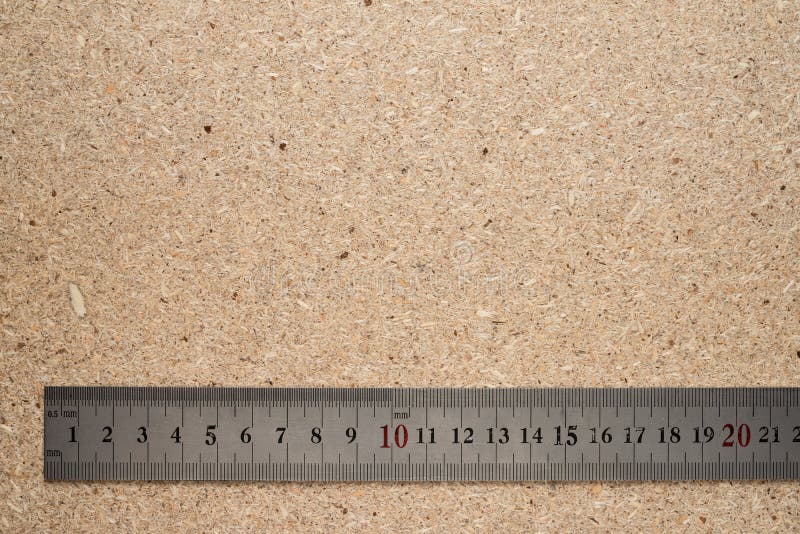 Chipboard Table and Metal Ruler Stock Photo - Image of industry ...